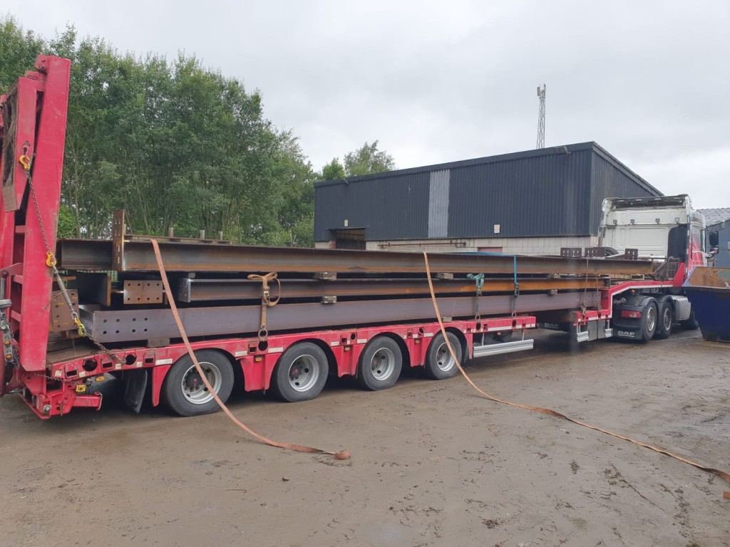 Walers and props being loaded onto extending low loader - Miller Steel