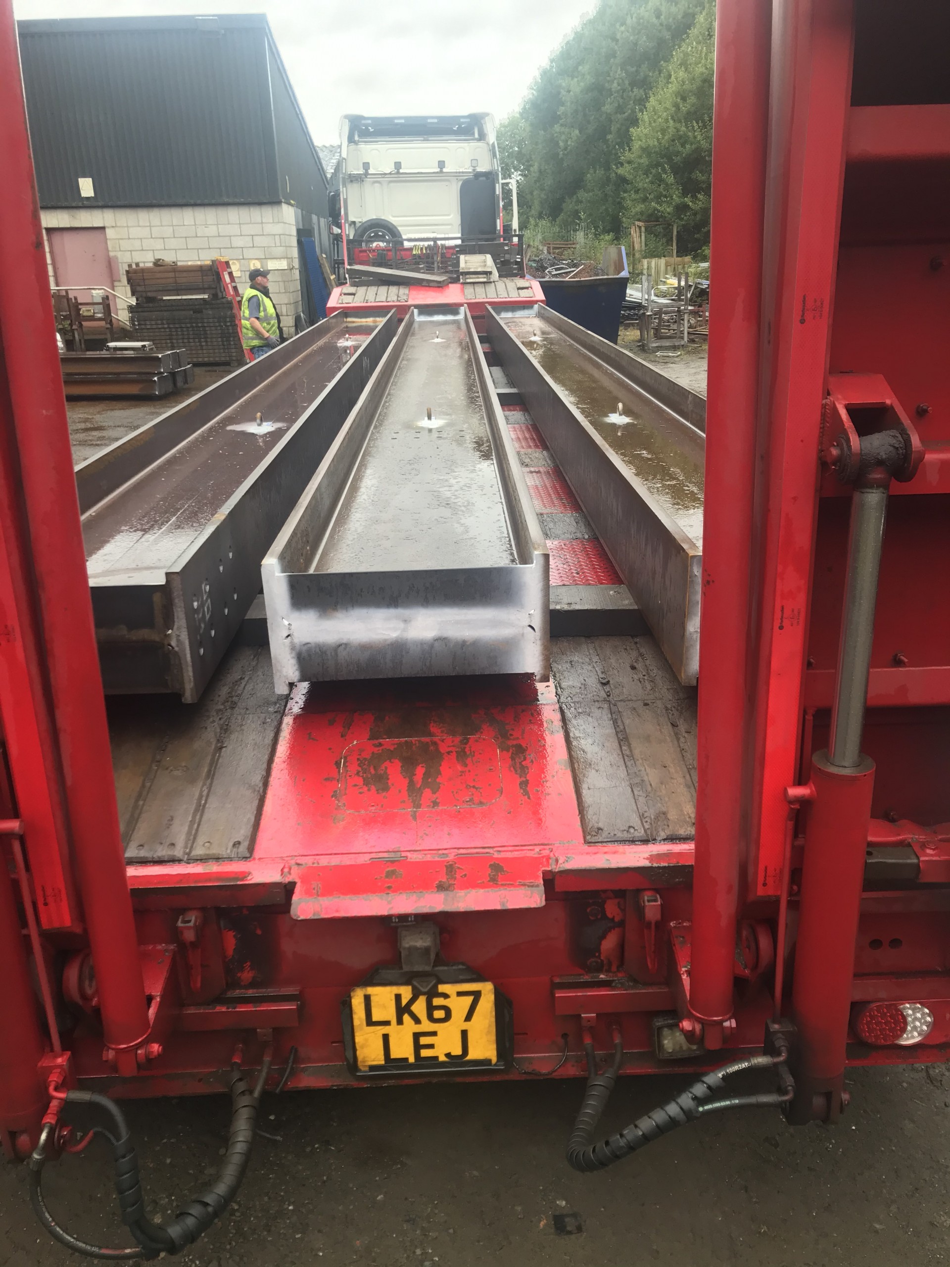 Walers and props being loaded onto extending low loader - Miller Steel